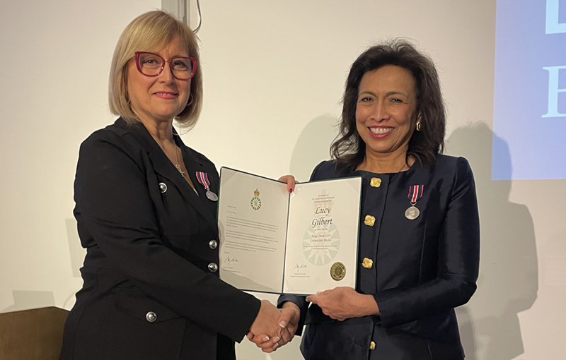 Dr. Lucy Gilbert, founder of DOvEEgene, is presented with the ...